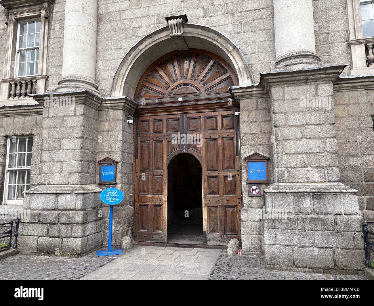 Trinity college regent house entrance. Historic university building entrance in Dublin, Ireland ...
