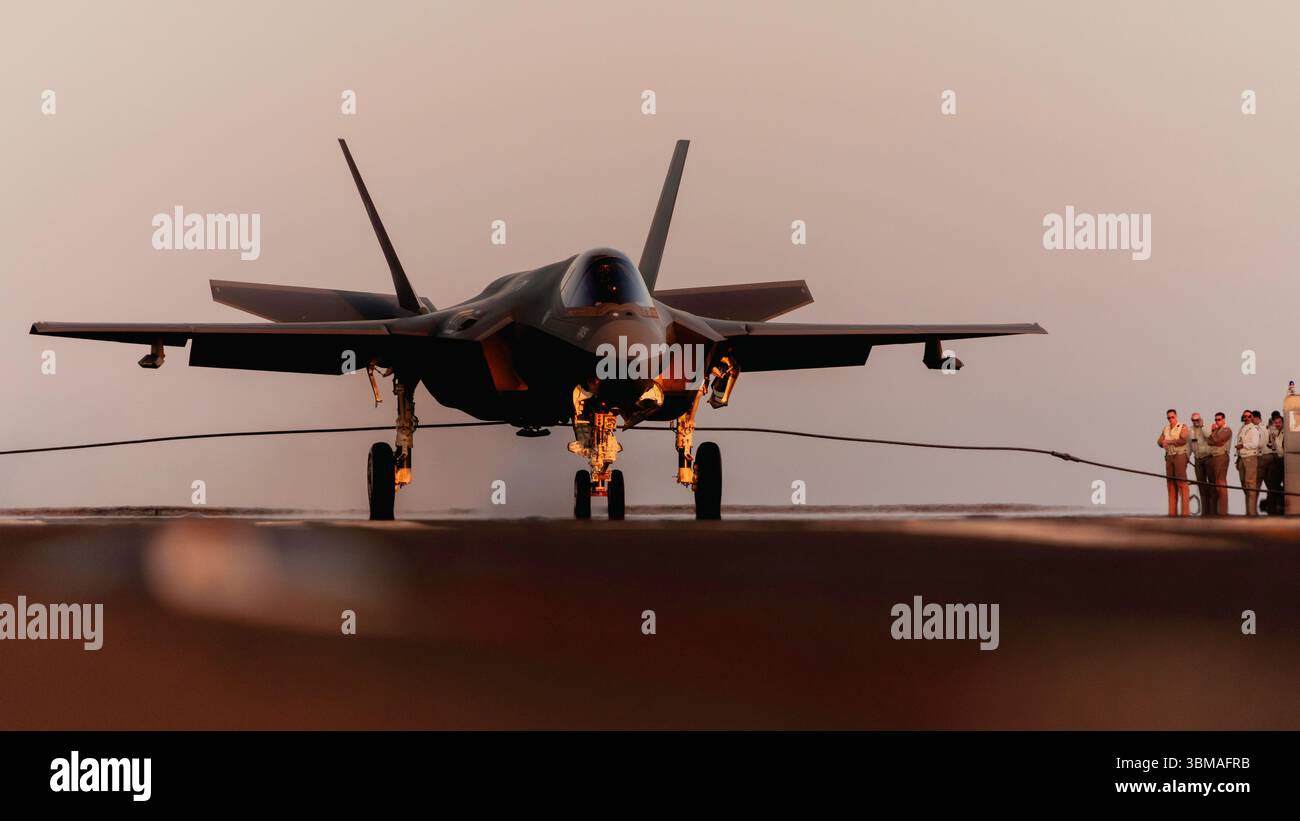 An F-35C Lightning II, attached to Strike Fighter Squadron (VFA) 147, on the flight deck of ...