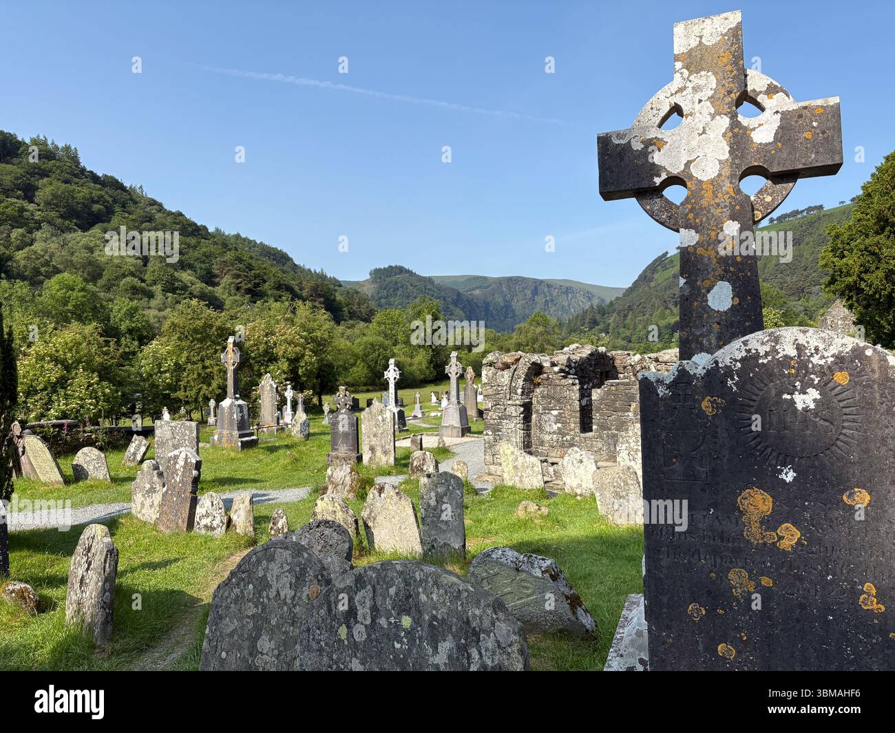 Celtic crosses in the historic Glendalough cemetery, County Wicklow ...