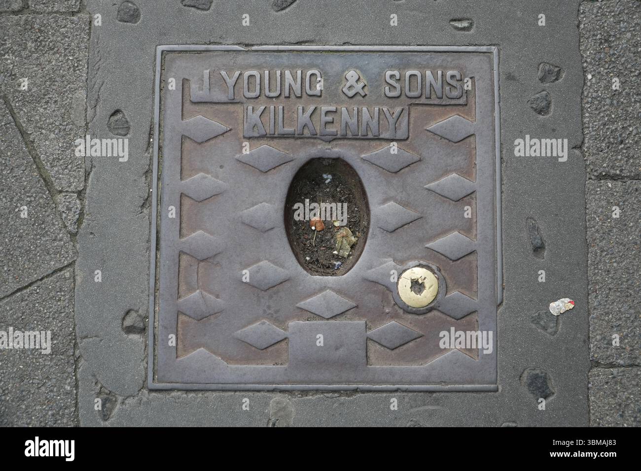J Young & Sons Kilkenny utility cover. Metal utility cover embedded in ...
