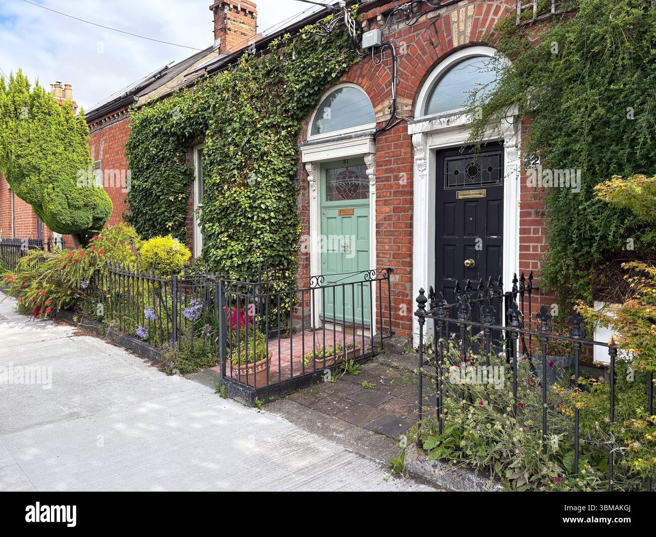 Residential houses in Dublin, Ireland. Exterior view of classic brick ...