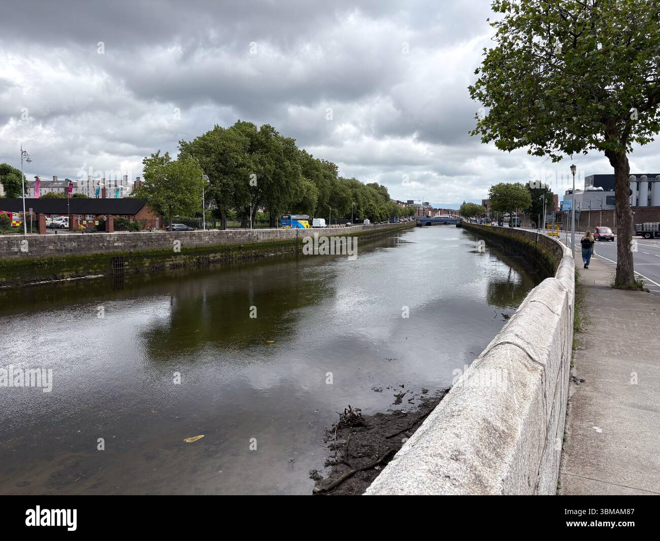 River Liffey. View of the Liffey riverbanks in Dublin, Ireland on a ...