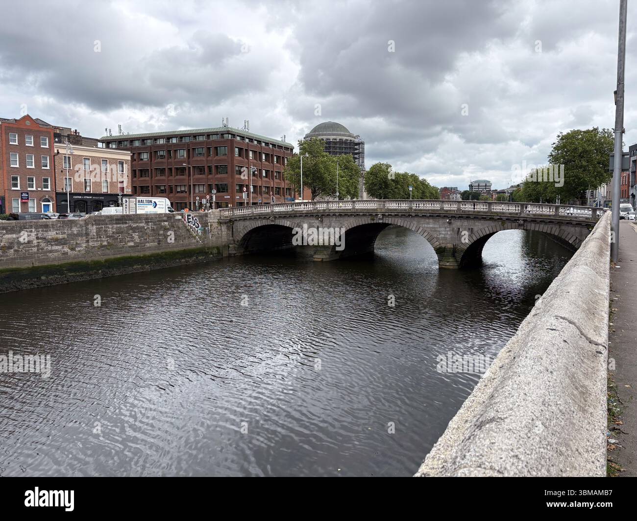 Father Mathew Bridge. Historic stone bridge over the River Liffey in ...