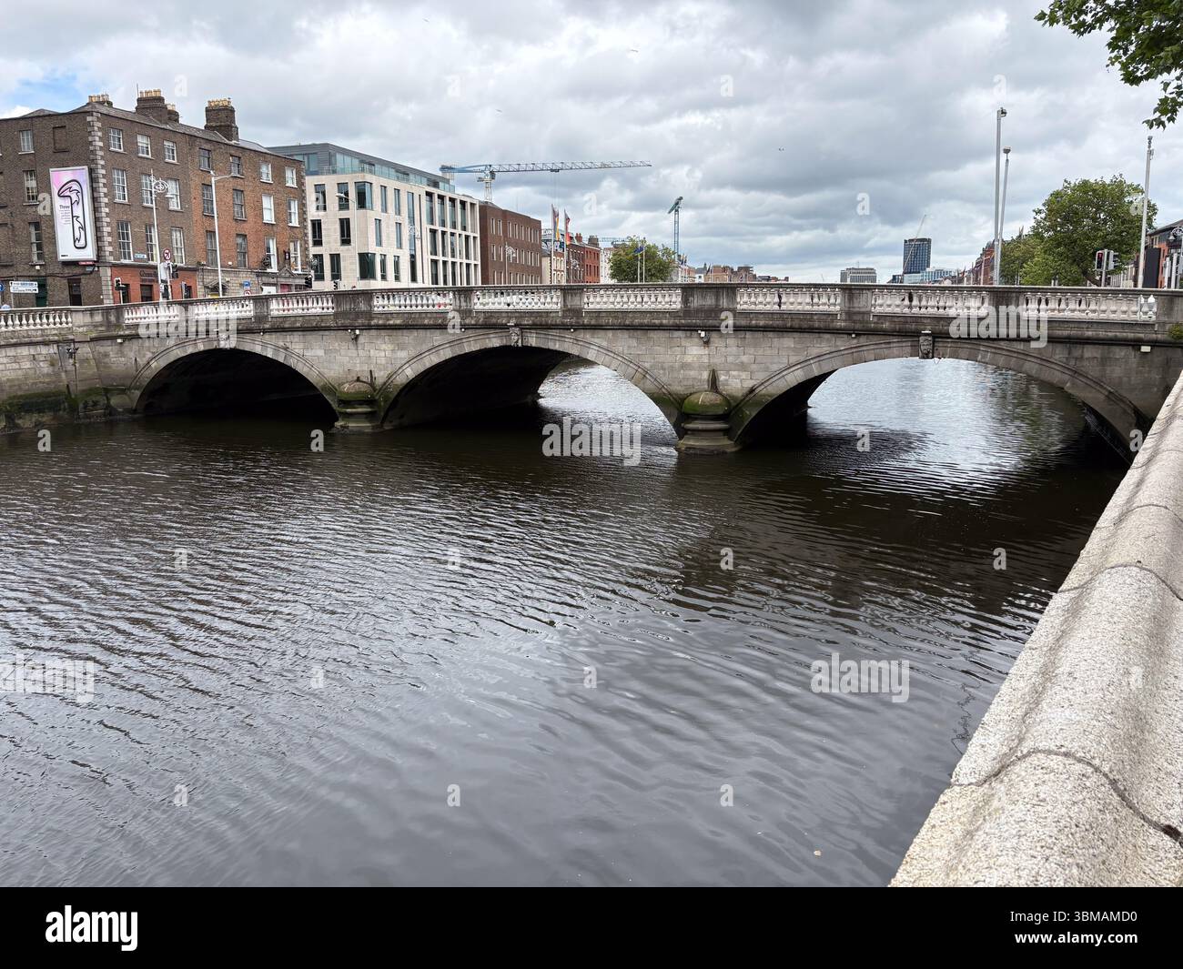 O'Donovan Rossa Bridge, a stone arch bridge over the River Liffey in ...