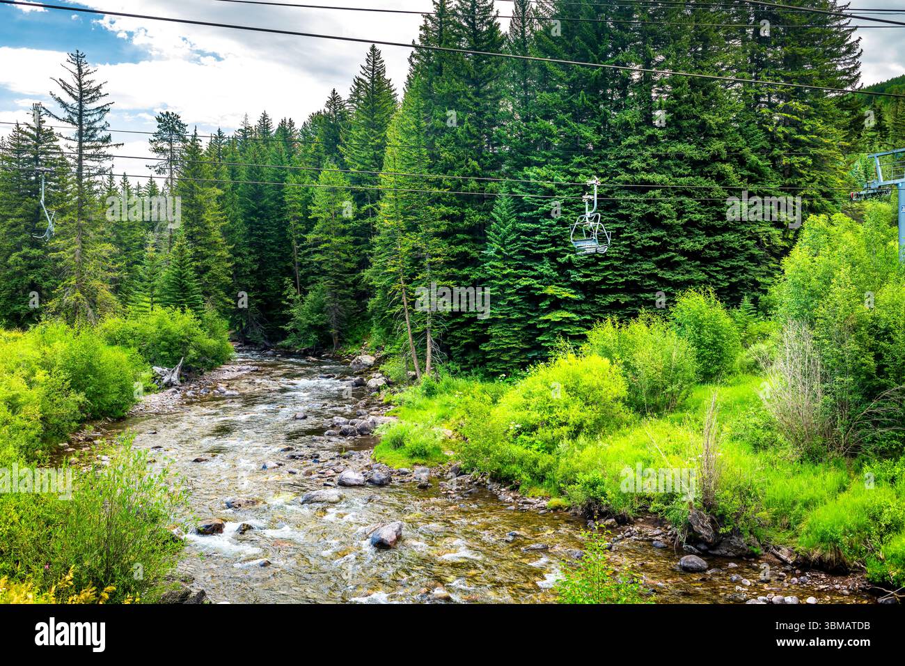 Vail Gore creek river flowing in Lionshead, Colorado village ski resort ...