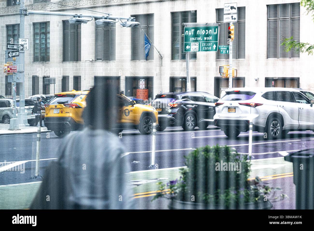 New York City buildings - reflection of street life in windows in ...