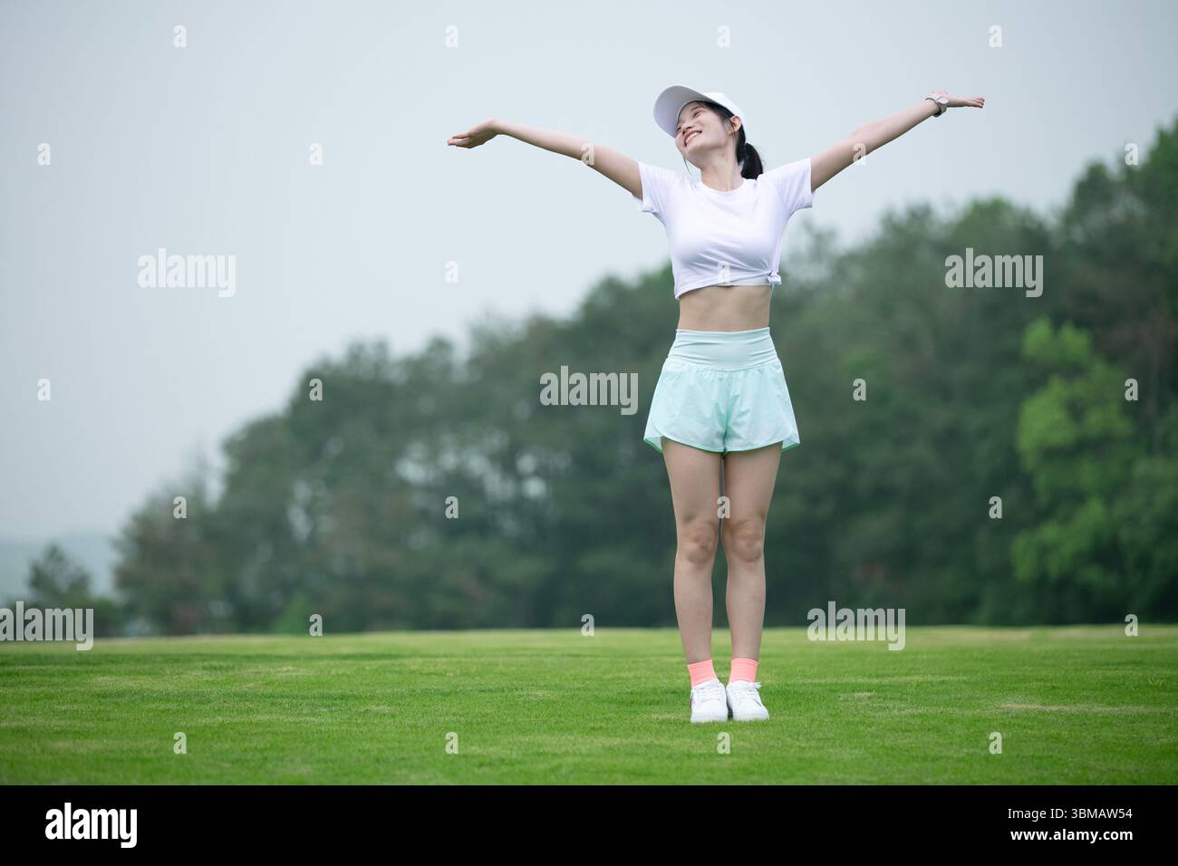 Raise both arms high hi-res stock photography and images - Alamy