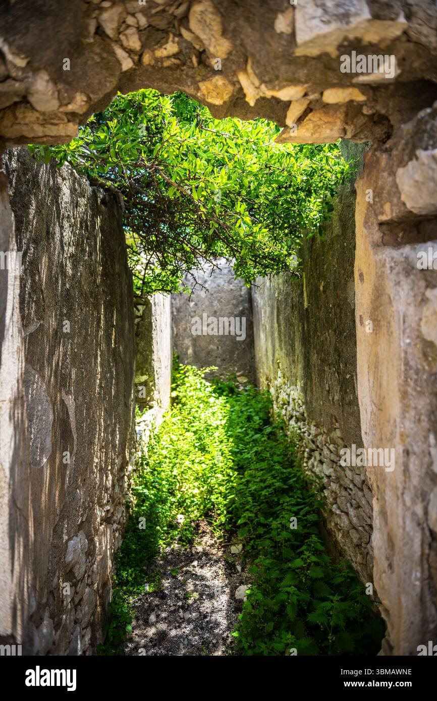 Abandoned stone structure inside house bunker ruin building in Ikaria ...