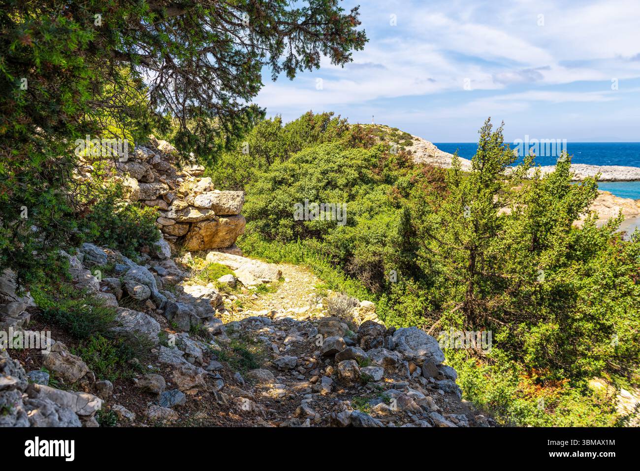 Stone rock wall at Ikaria island Greece trail footpath in Greek ...
