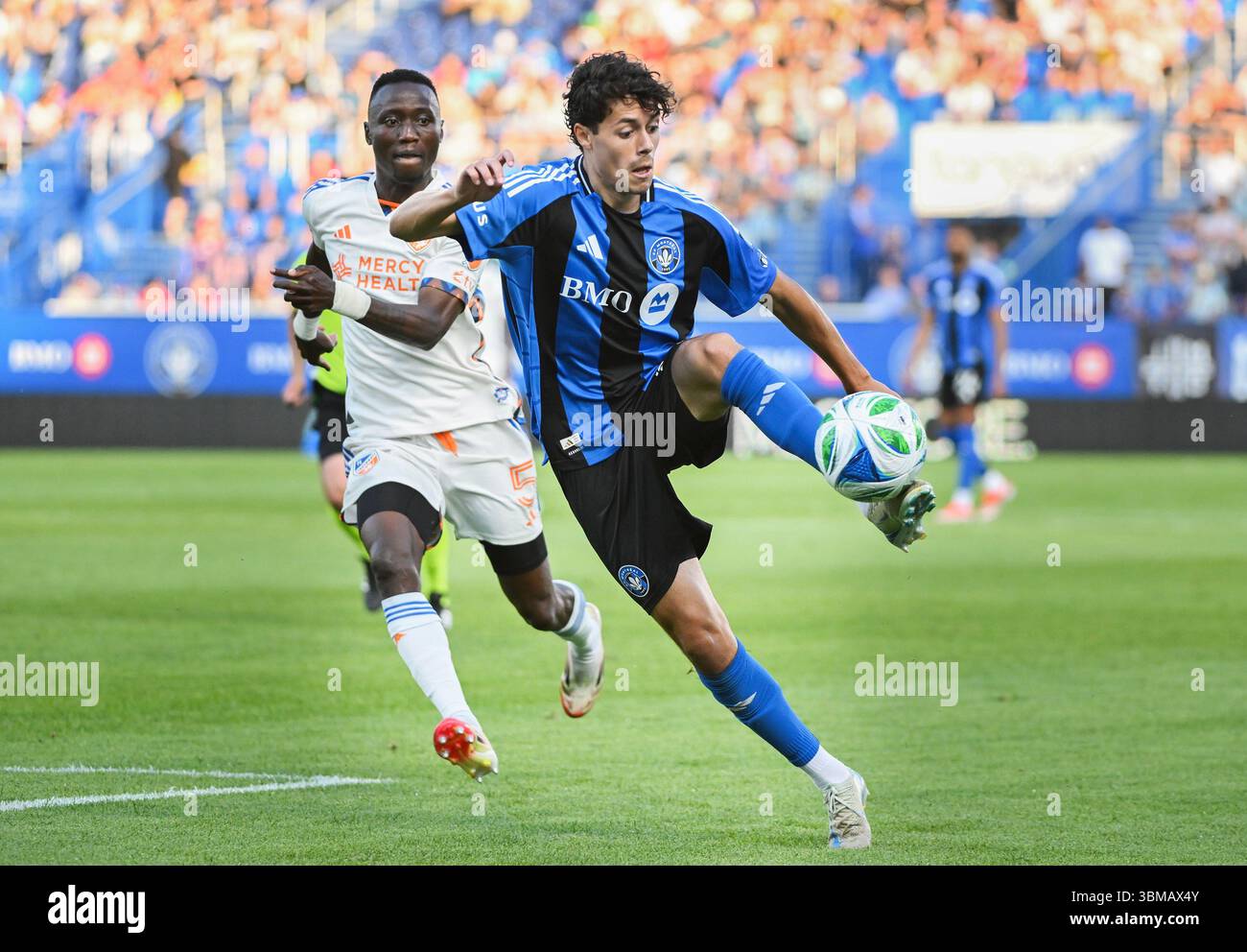 Montreal, Canada. 25th June, 2025. CF Montreal's Caden Clark, right ...