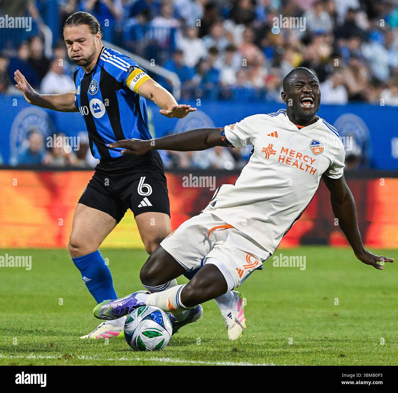 CF Montreal's Samuel Piette (6) challenges FC Cincinnati's Kevin Denkey ...