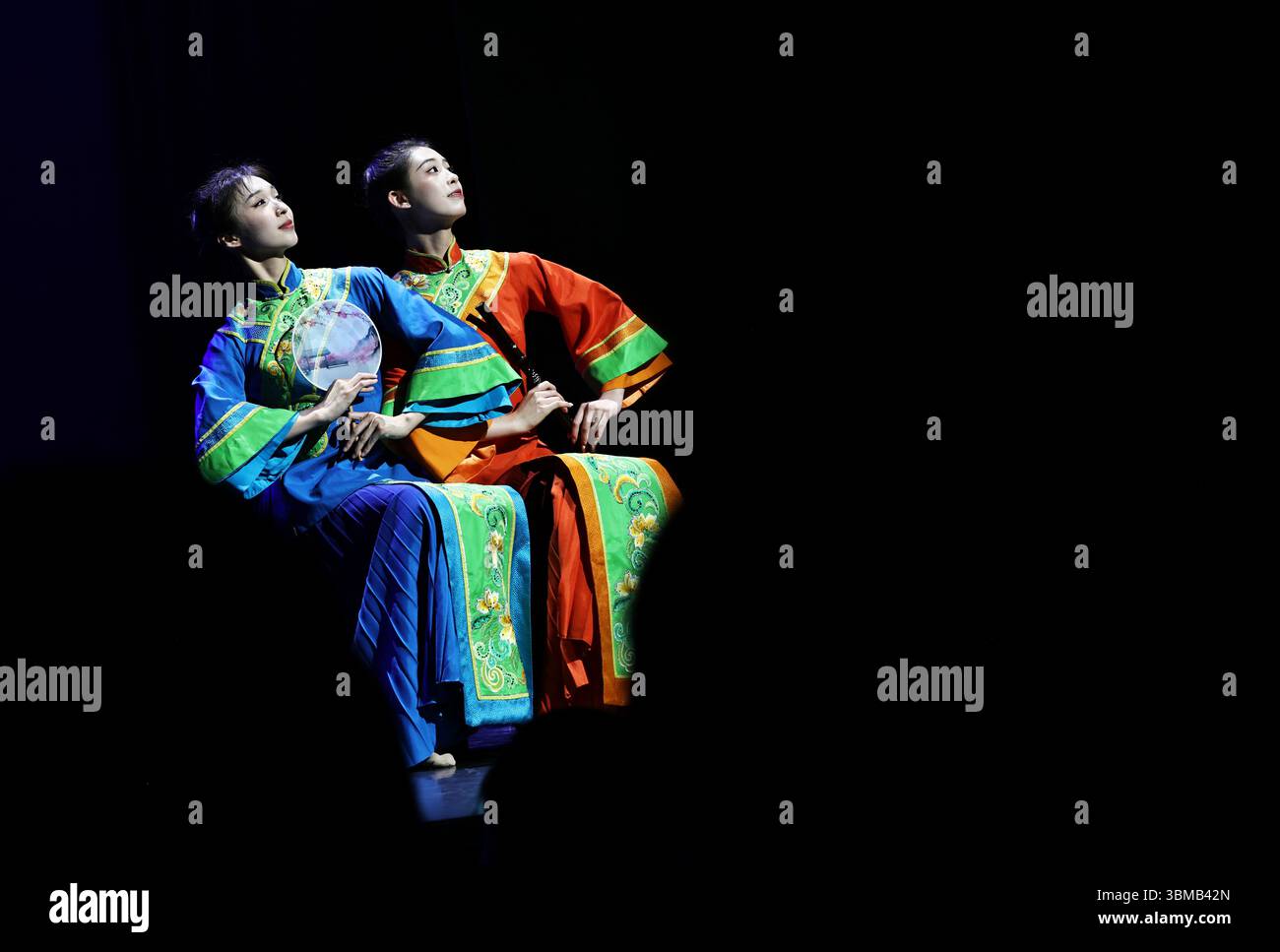 Beijing, France. 24th June, 2025. Dancers perform during a traditional ...
