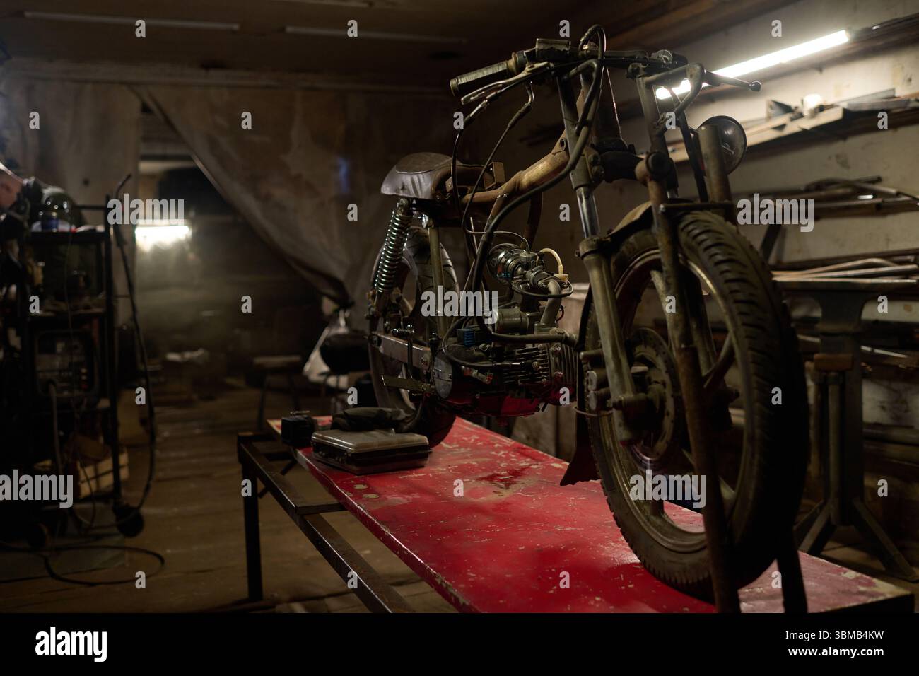 Custom Motorcycle in Workshop Garage Stock Photo - Alamy
