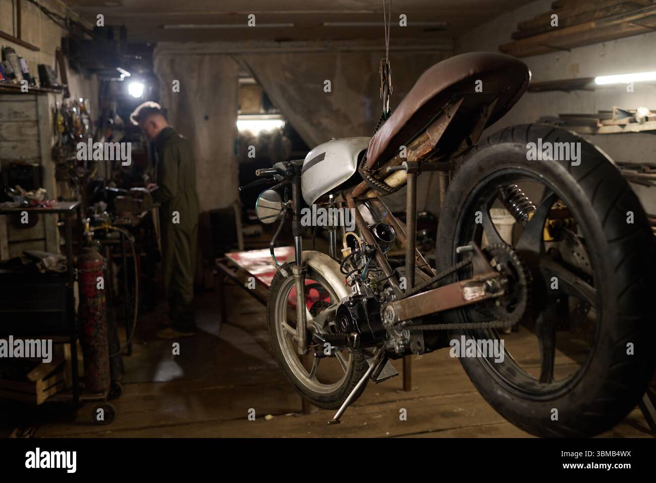Caucasian Young Adult Man Constructing Custom Motorcycle Frame in ...