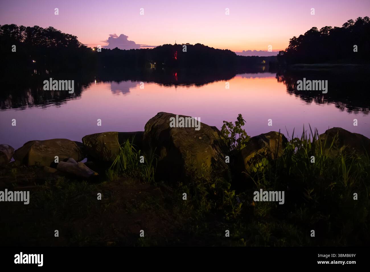 Stone Mountain Lake in Atlanta, Georgia's Stone Mountain Park at dusk ...