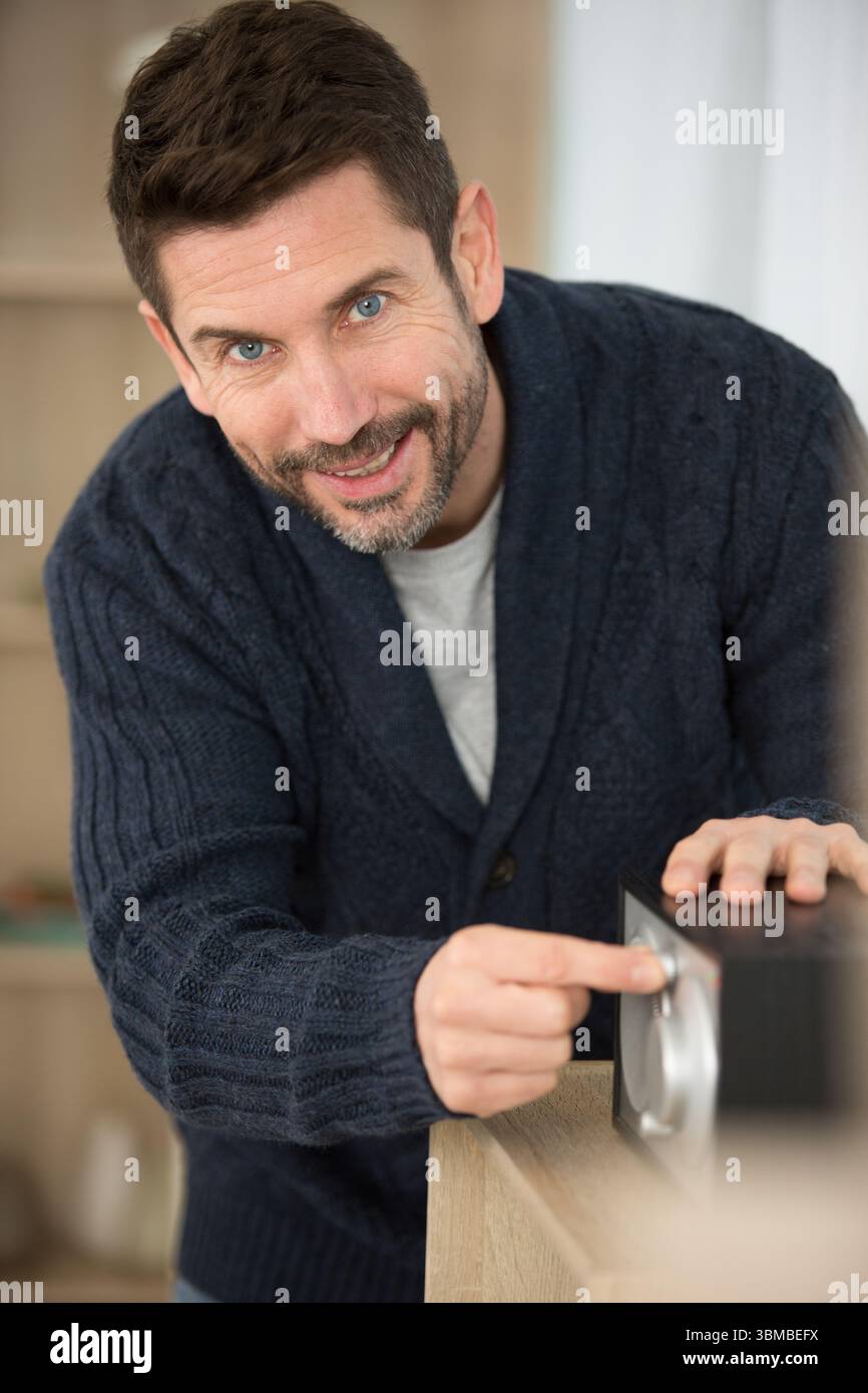 Man tuning a radio hi-res stock photography and images - Alamy