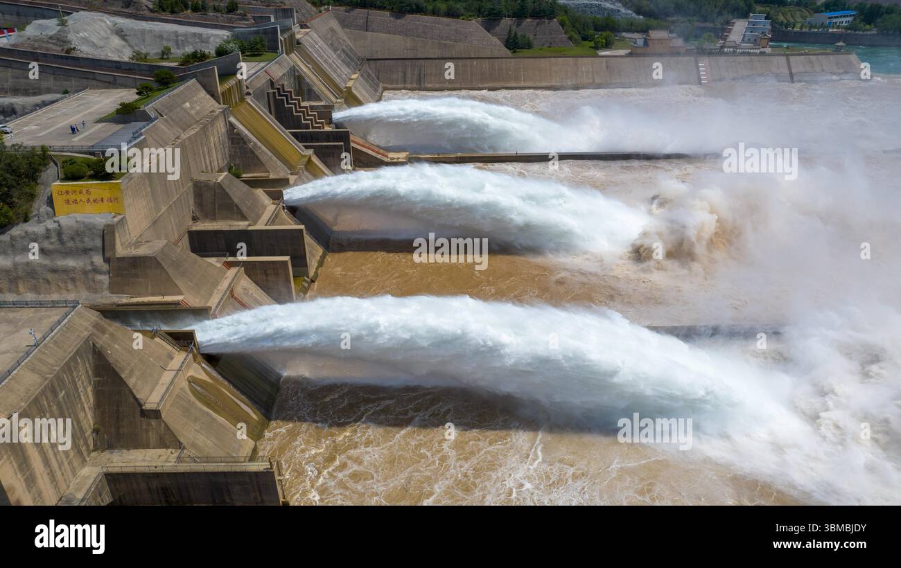 Water gushes out from the Xiaolangdi Reservoir on the Yellow River in ...