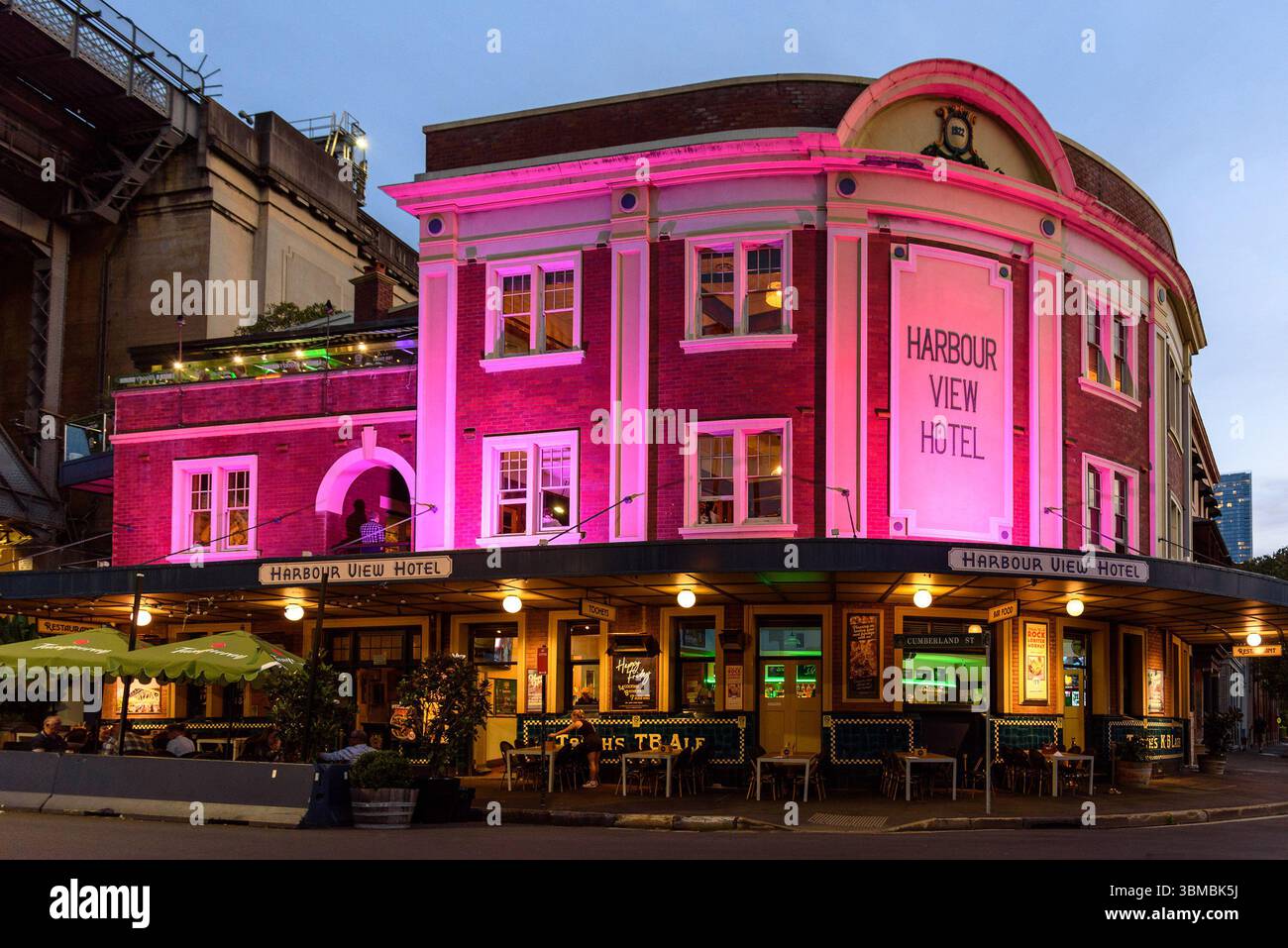 The purple-tinted facade of the Harbour View Hotel in the Rocks area of ...