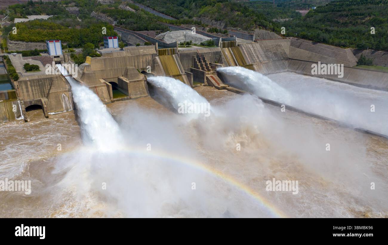 Water gushes out from the Xiaolangdi Reservoir on the Yellow River in ...
