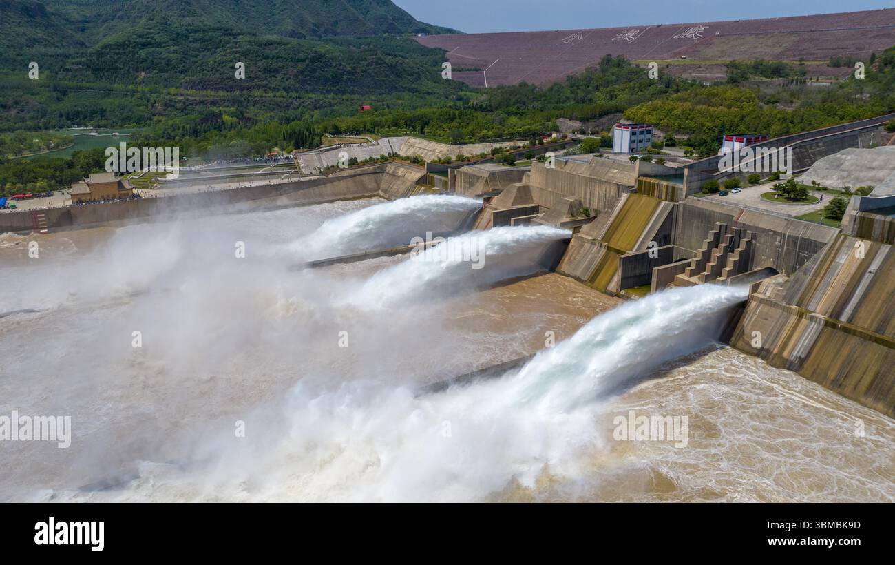 Water gushes out from the Xiaolangdi Reservoir on the Yellow River in ...