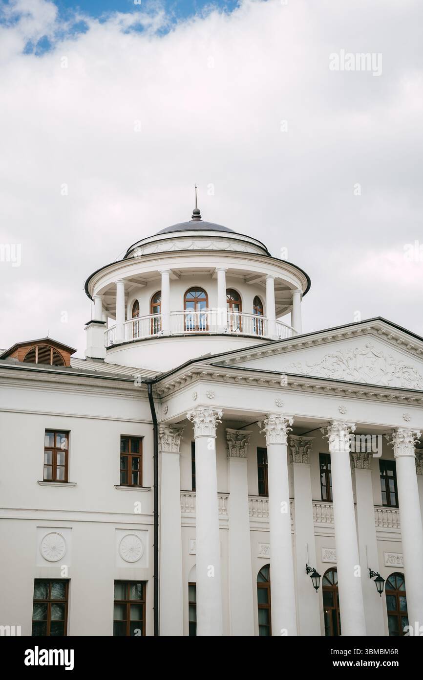 Elegant white neoclassical mansion with rotunda and Corinthian columns ...