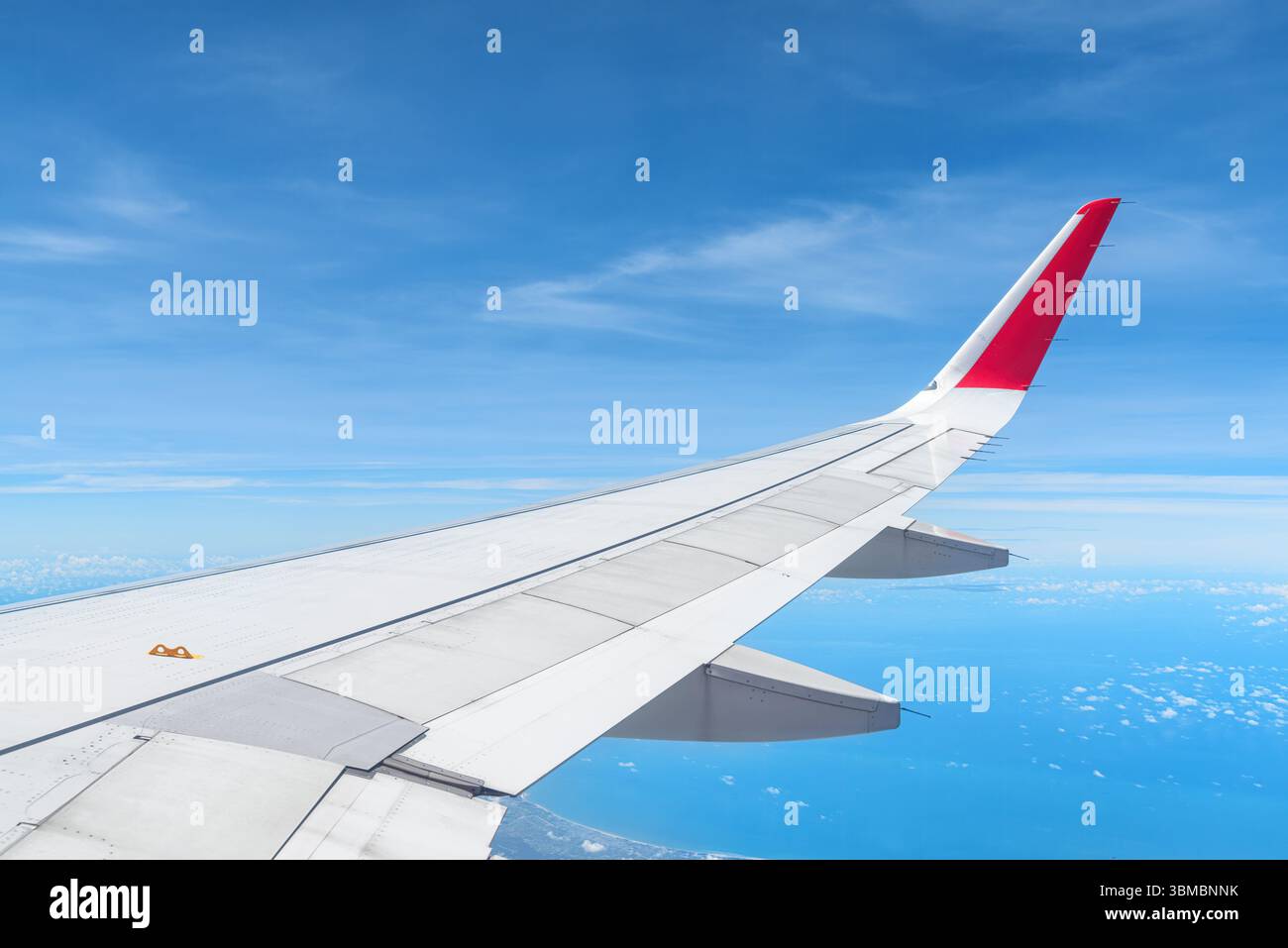 Awesome view of the Earth under the airplane wing Stock Photo - Alamy