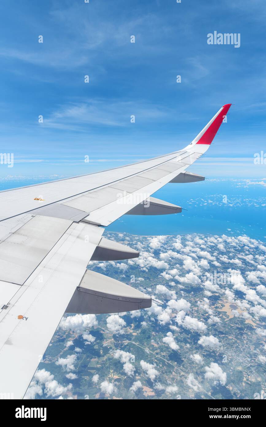 Awesome view of the Earth under the airplane wing Stock Photo - Alamy