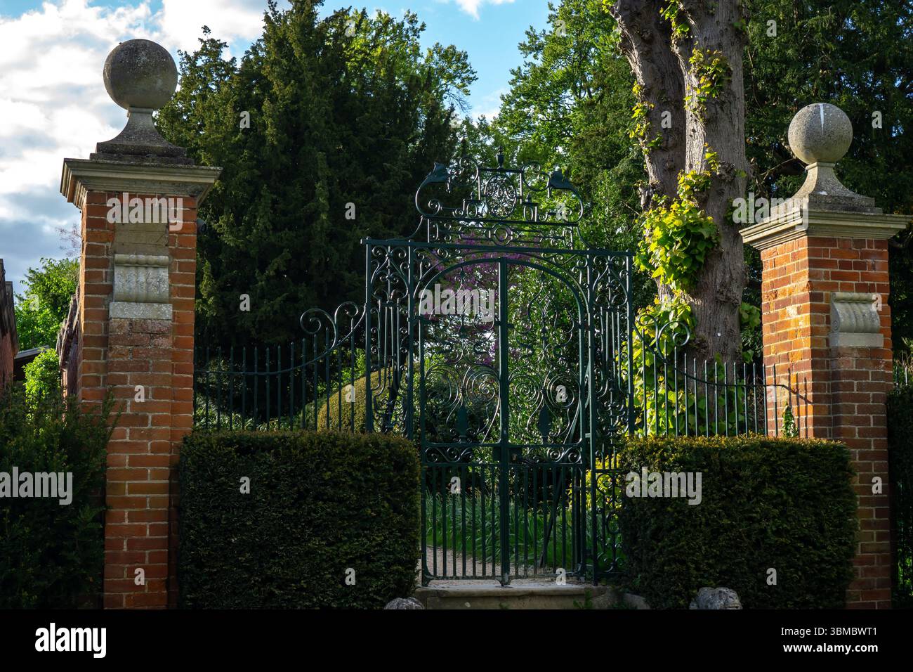 Ornate gates welcome visitors to the beautiful Bridge End Gardens in ...