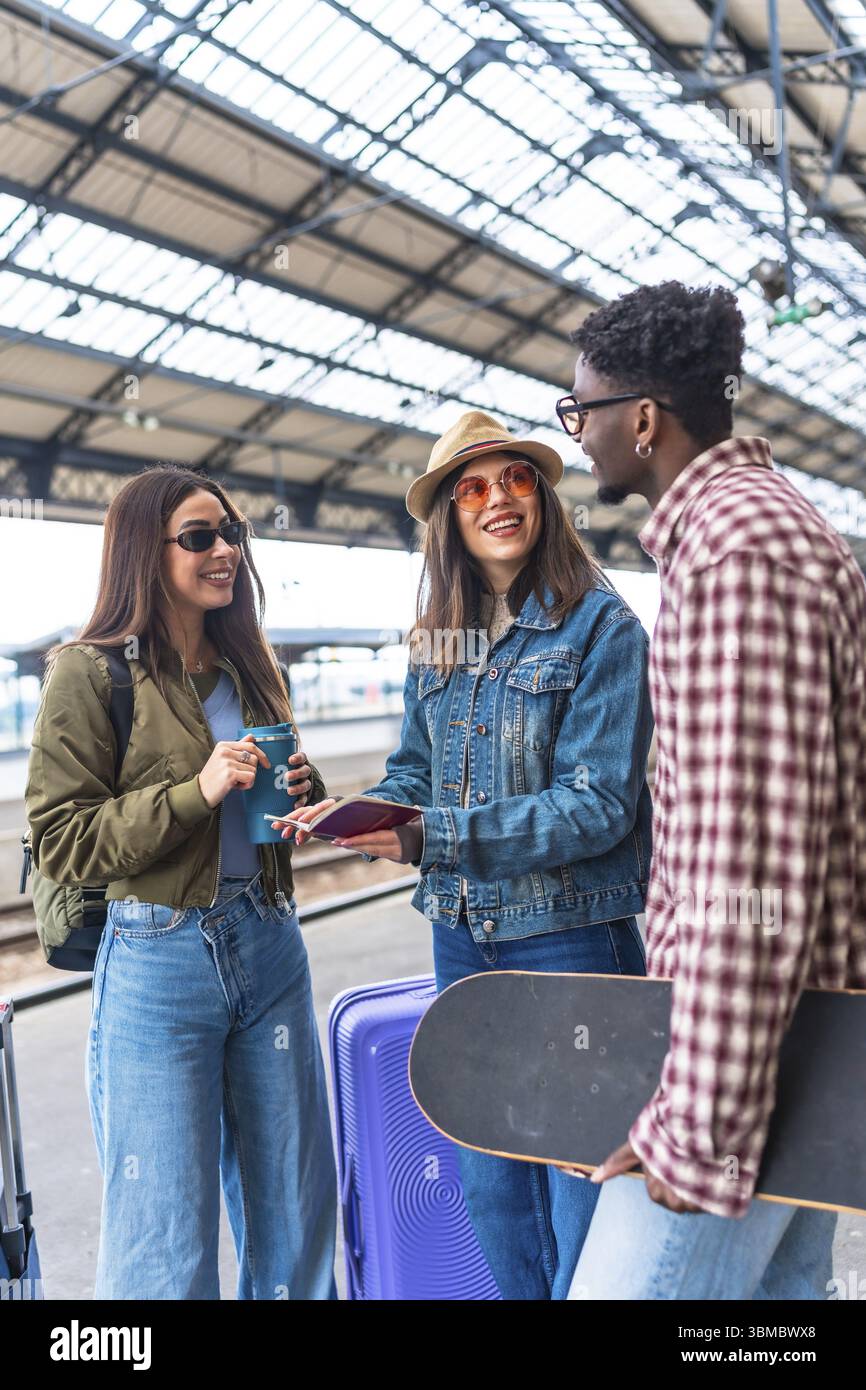 Happy diverse group of young tourists checking passports and smiling ...