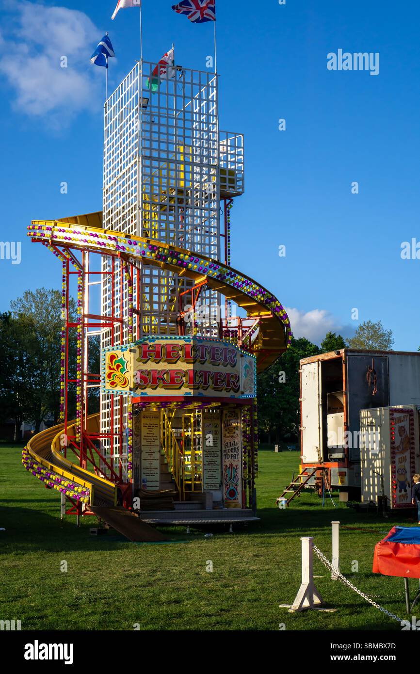 A helter skelter ride at a funfair in Saffron Walden, Essex, England ...