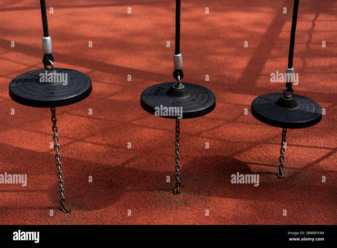 Modern hanging round swings hi-res stock photography and images - Alamy