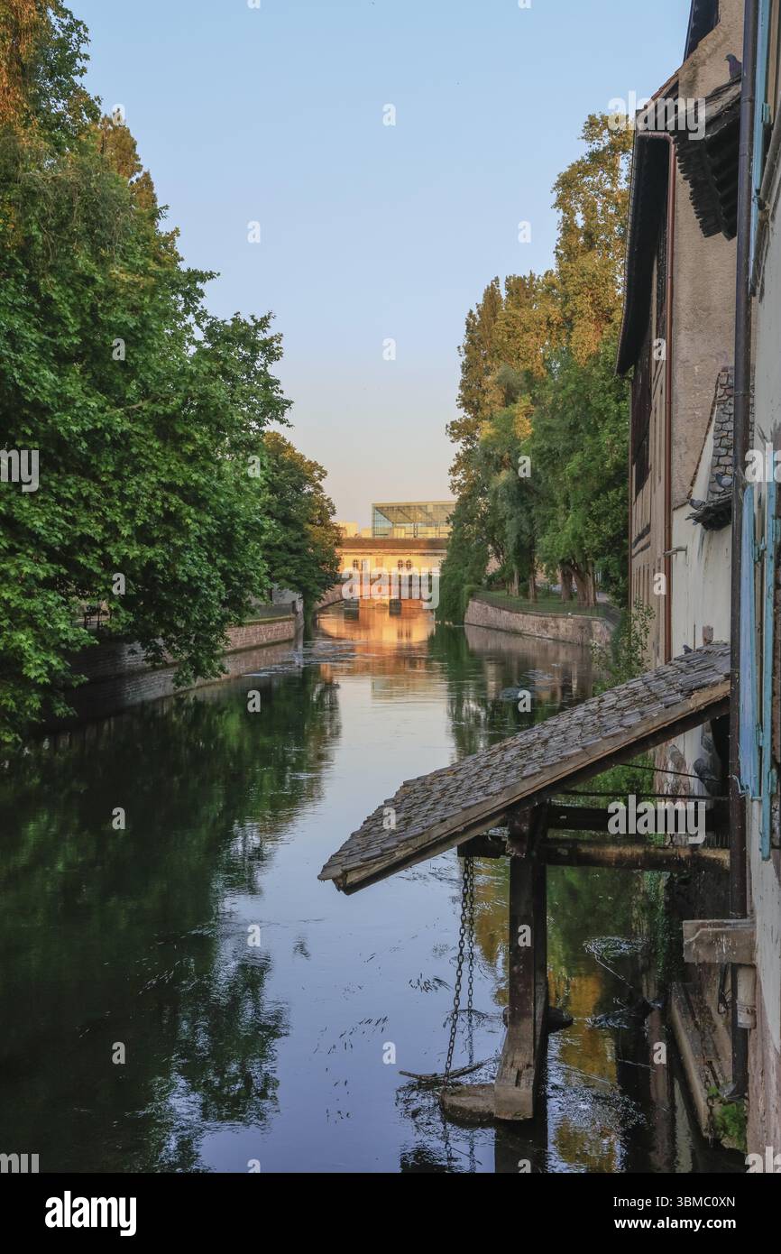 Arm of the River Ill in the tanners' quarter La Petite France, behind ...
