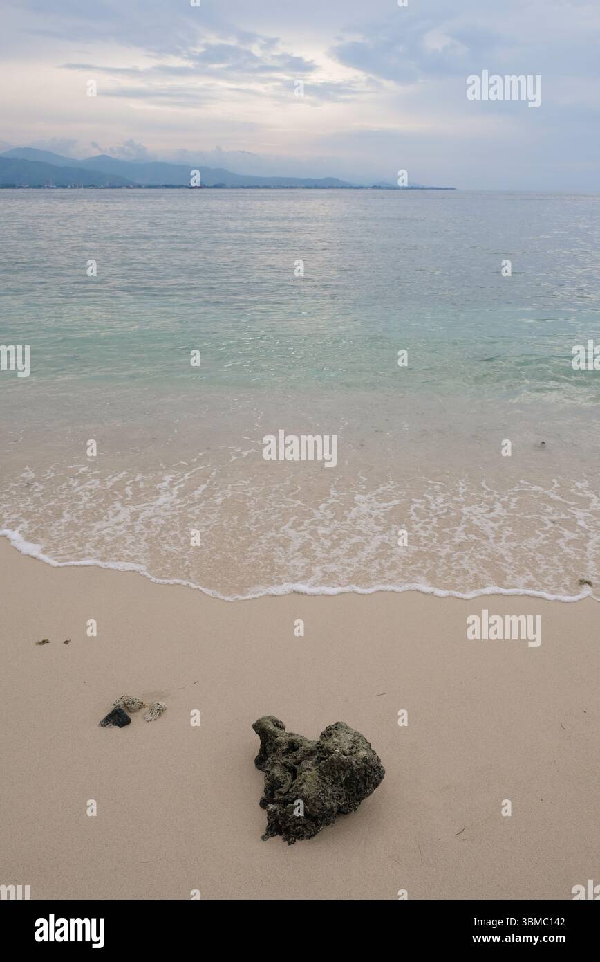 Tropical exotic paradise view of Cristo Rei Beach in Dili, Timor Leste ...