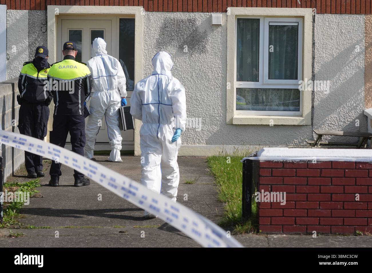 Garda officers at the scene in Foxdene Drive, Balgaddy after a man died ...