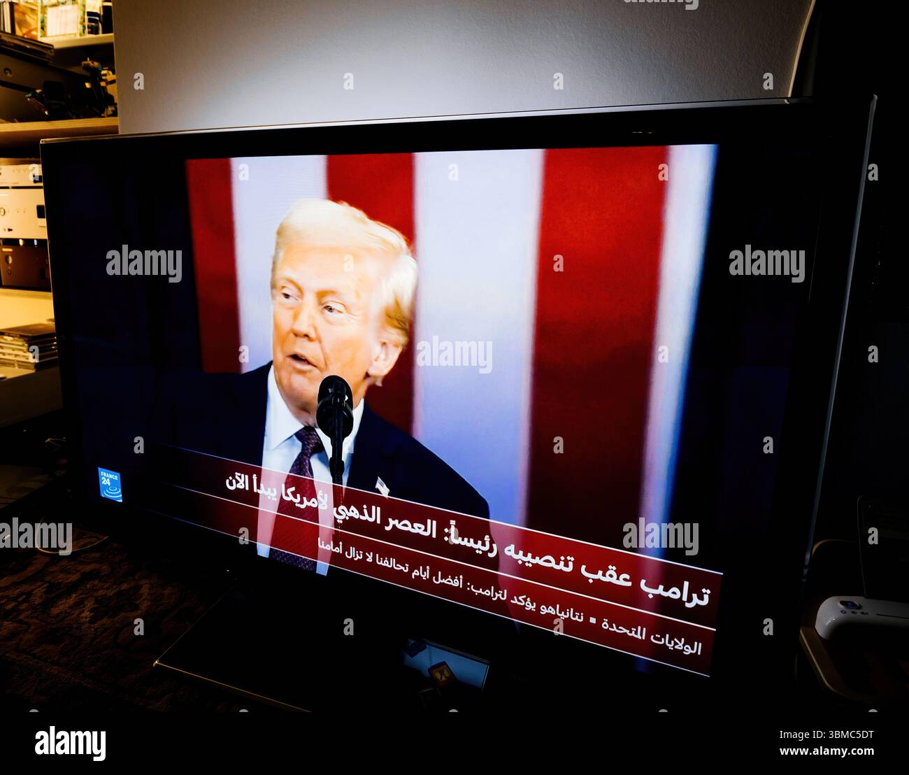 Paris, France - Jan 20, 2025: TV screen shows Donald Trump speaking ...