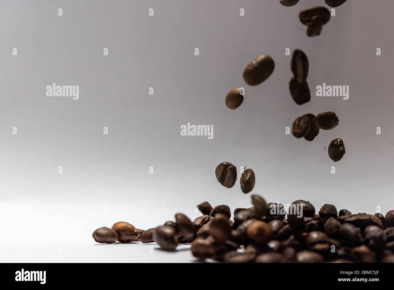 coffee bean , brown falling Stock Photo - Alamy