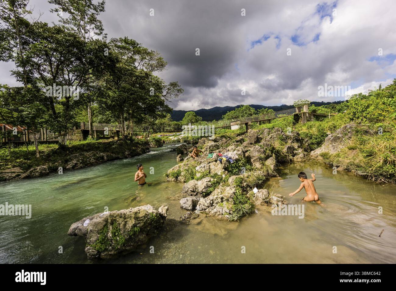 Washing clothes in the Cuatro Chorros river, Lancetillo, La Parroquia ...