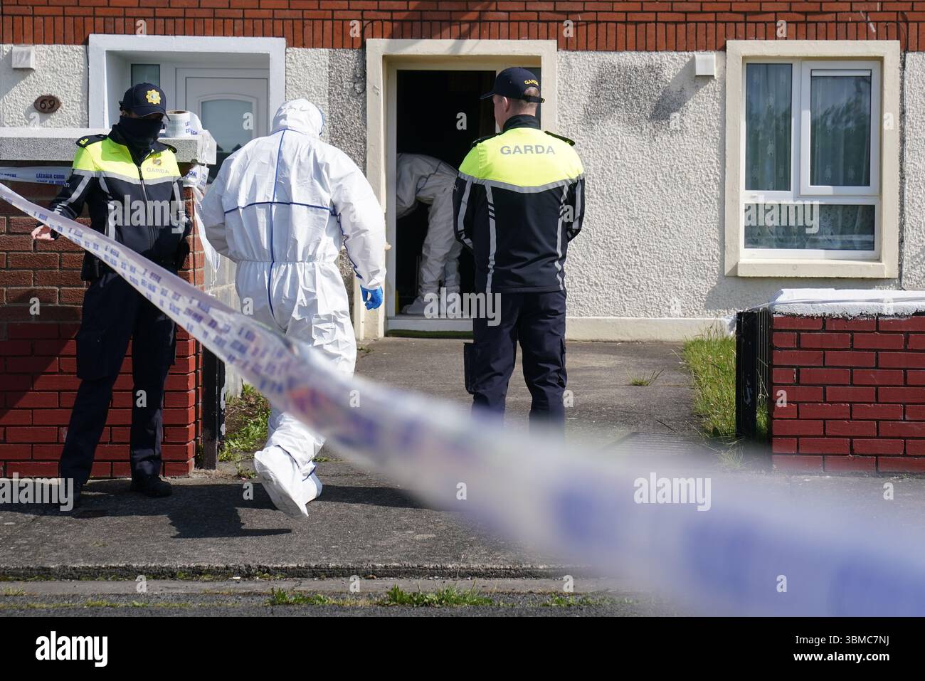 Garda officers at the scene in Foxdene Drive, Balgaddy after a man died ...