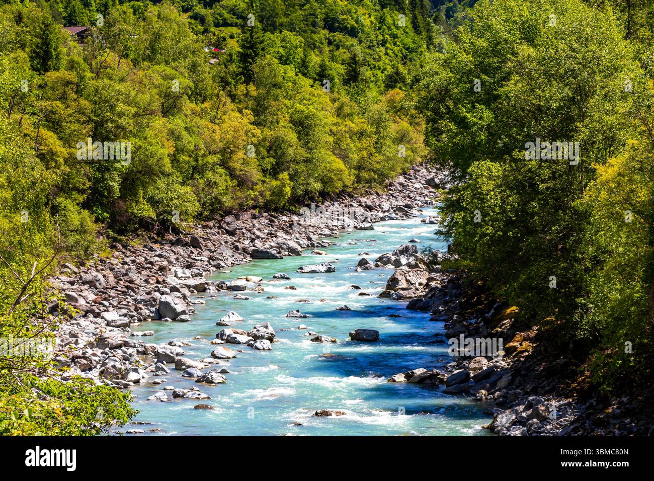 Turquoise blue and green river steam and waterfall Inn with stones ...