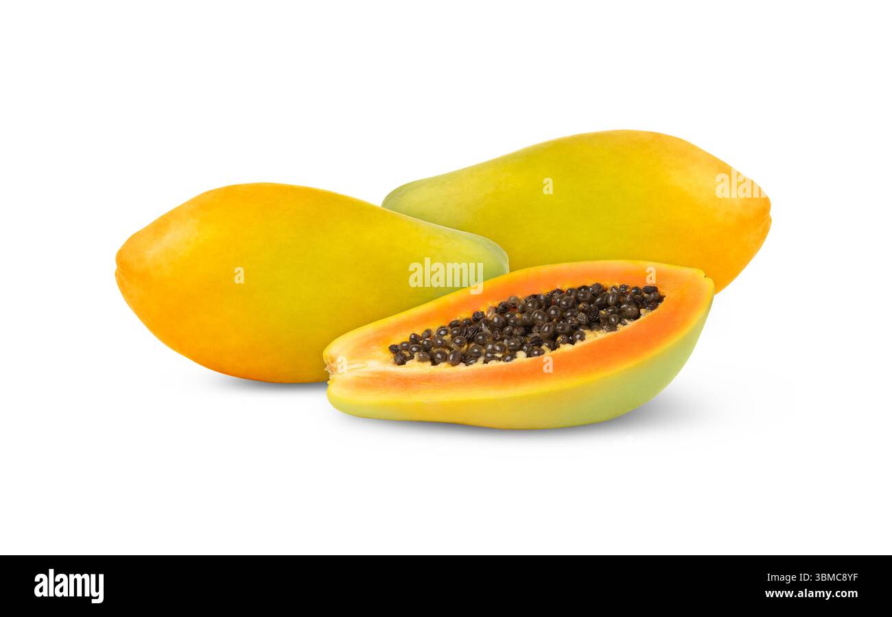 Colorful sweet papayas and a half of ripe papaya fruit with seeds ...