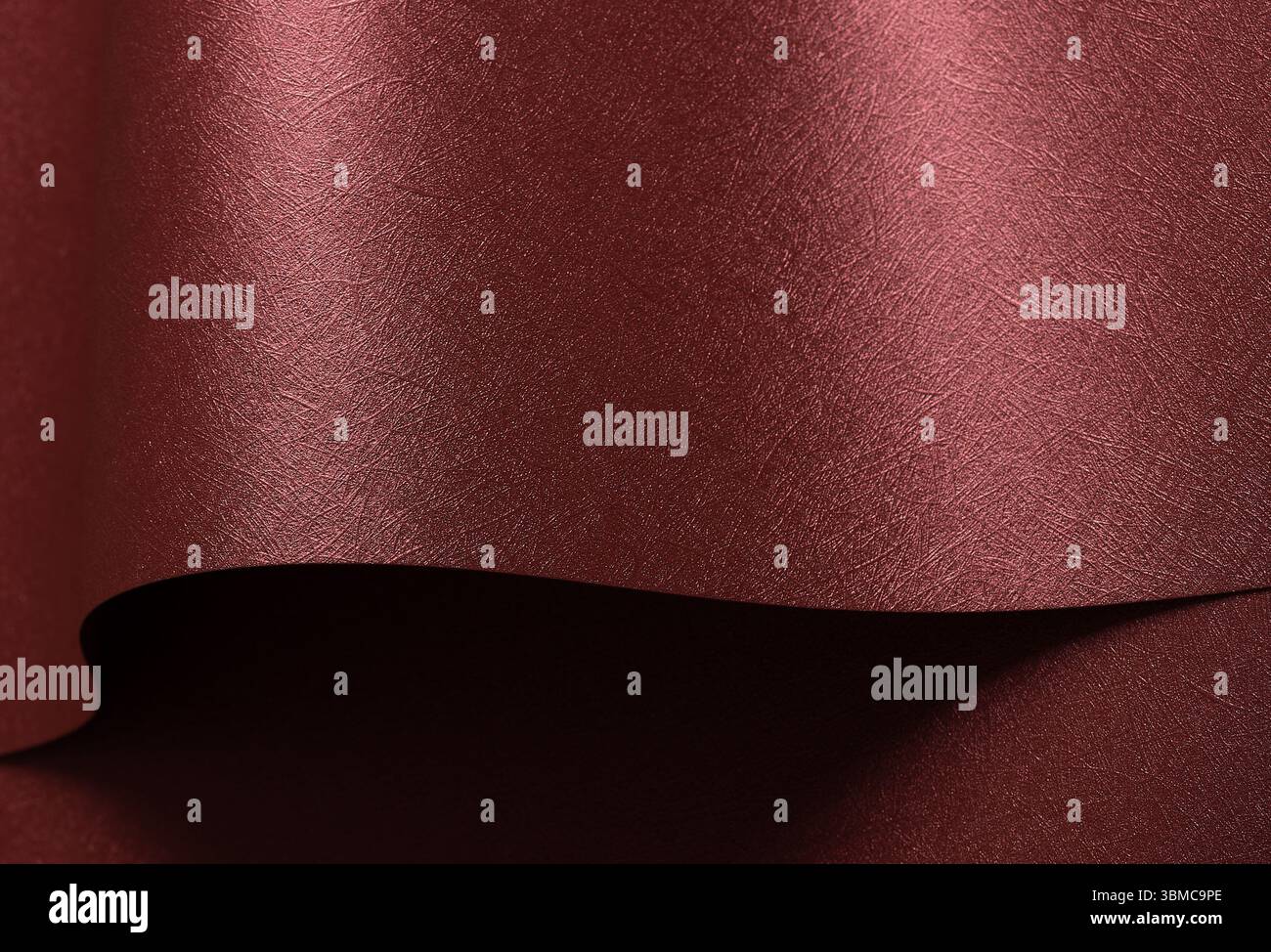 Chic paper background in red and marsala. Pearlescent metallic surface ...