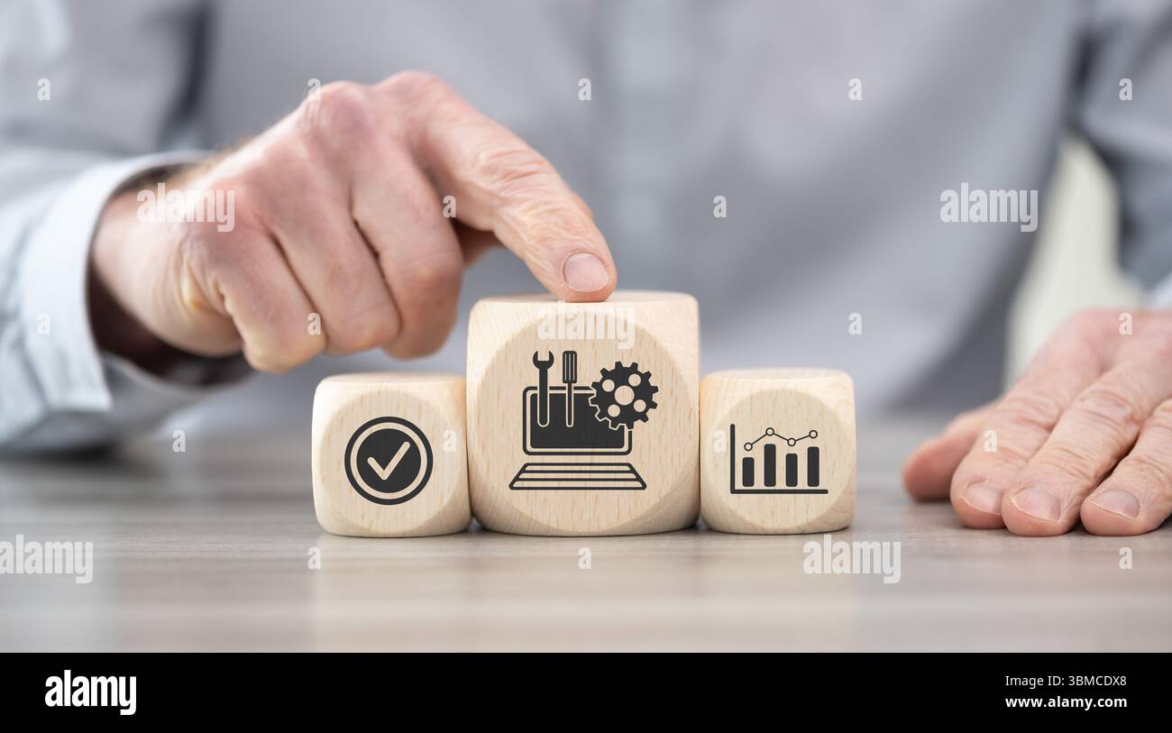 Wooden blocks with symbol of system maintenance concept Stock Photo - Alamy
