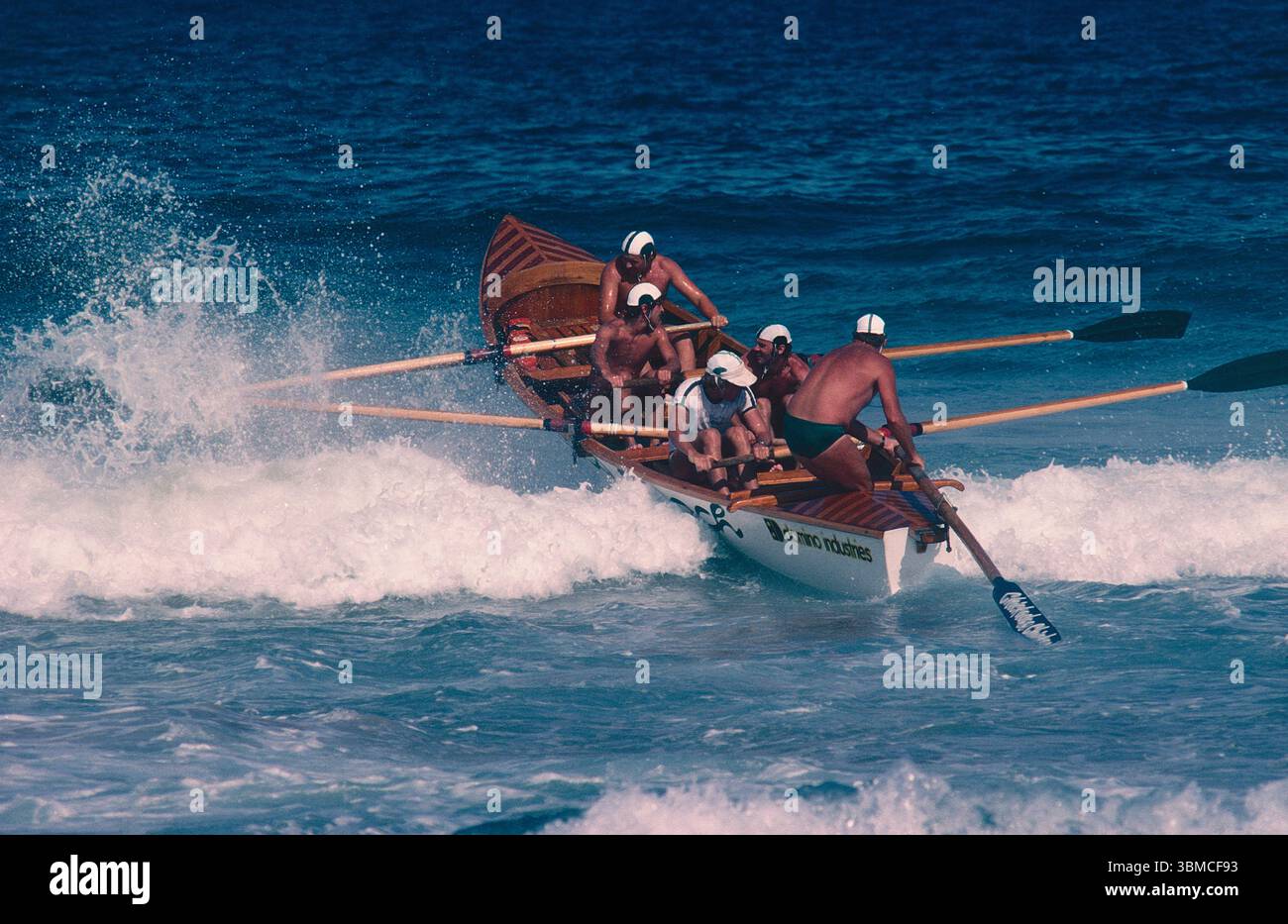 Surf life saving rowing boat wave hi-res stock photography and images ...