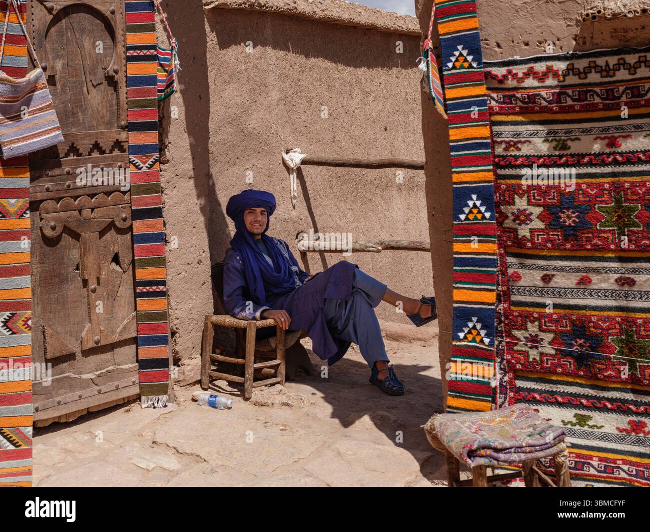 Morocco, 25 May 2025. A man dressed in traditional Berber clothing sits ...