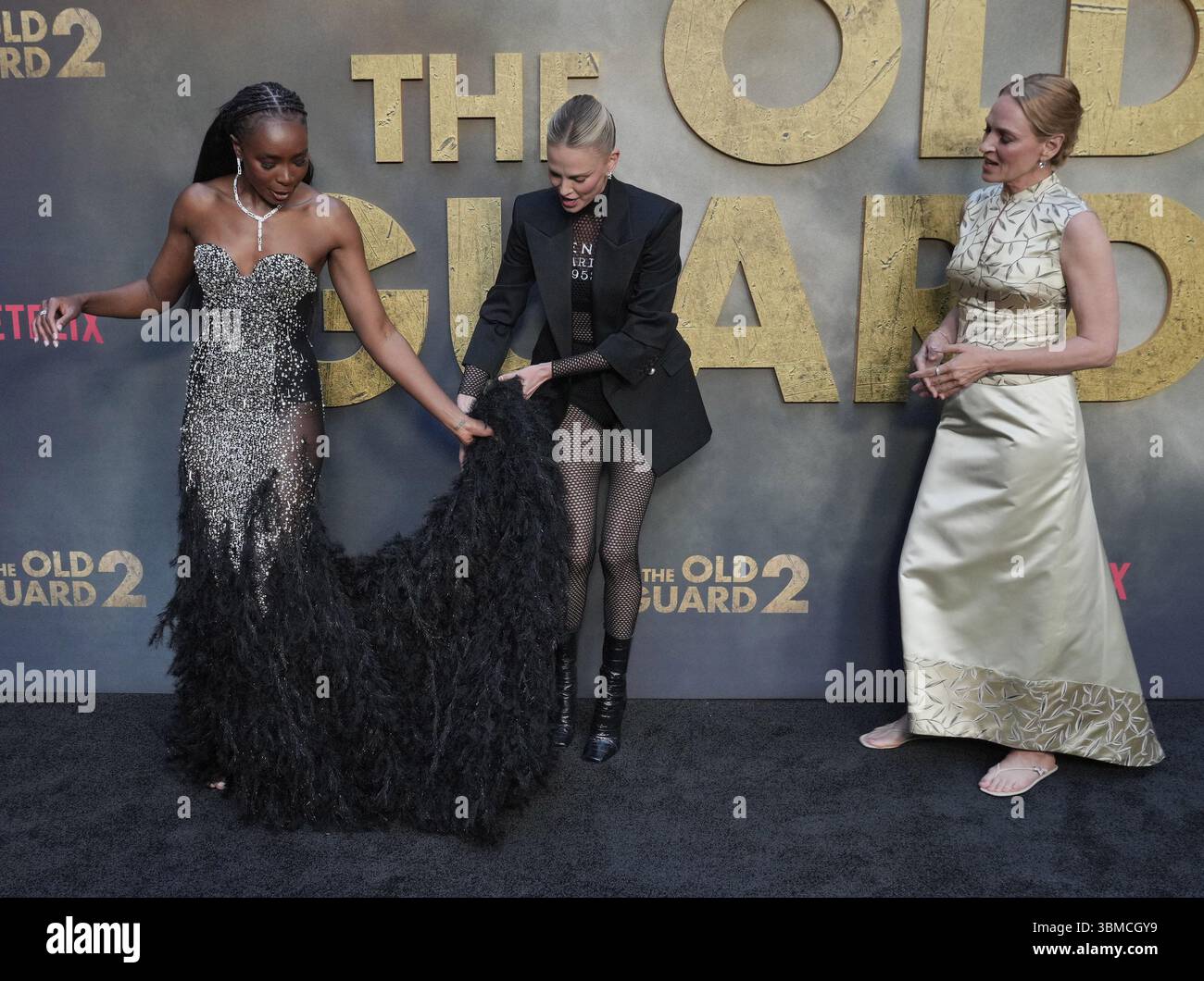 (L-R) KiKi Layne, Charlize Theron and Uma Thurman at the Netflix's THE OLD GUARD 2 Los Angeles ...