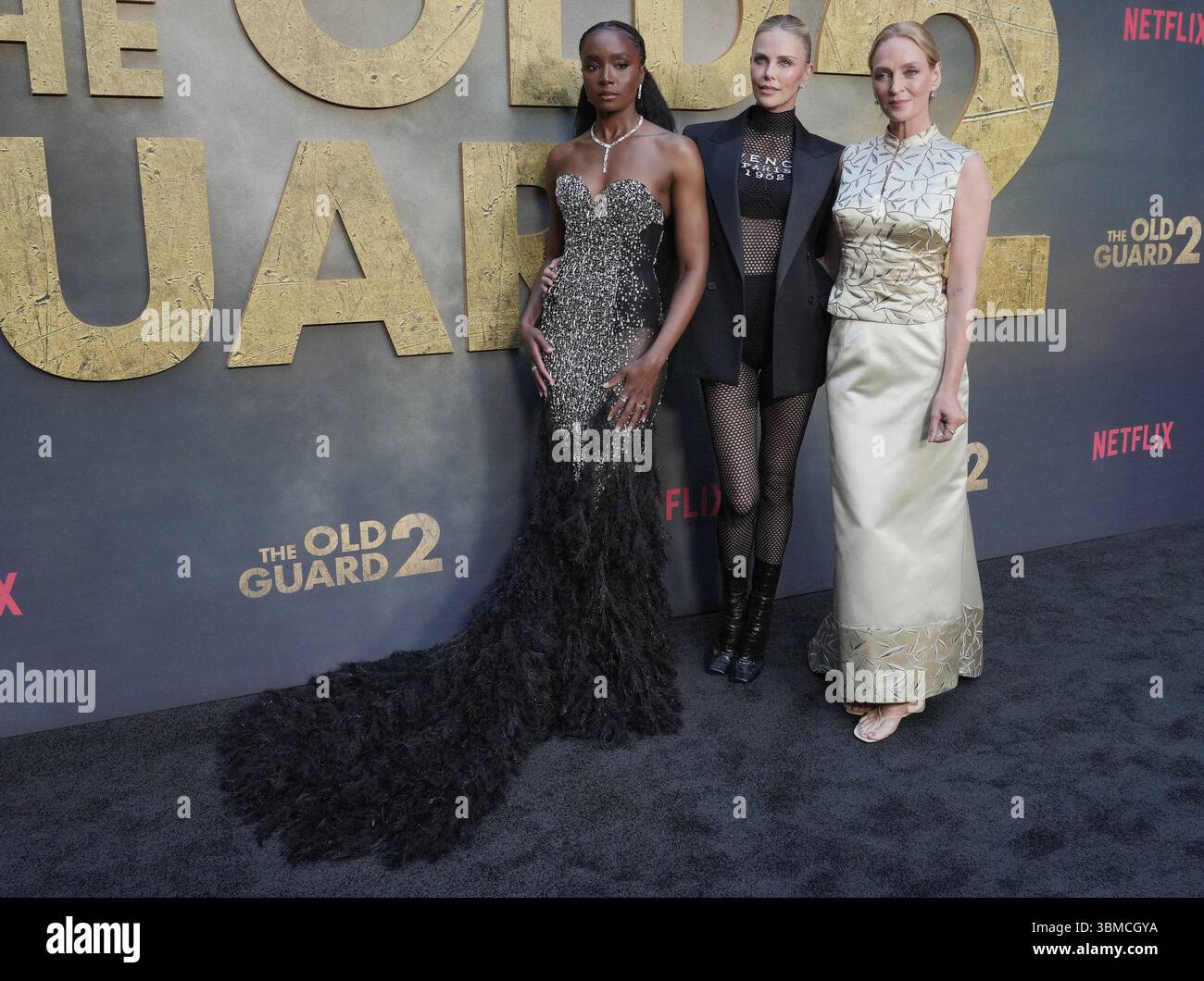 (L-R) KiKi Layne, Charlize Theron and Uma Thurman at the Netflix's THE OLD GUARD 2 Los Angeles ...