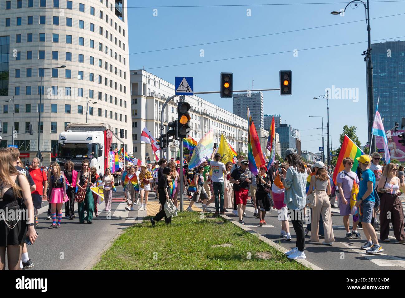 Diverse crowd celebrates lgbtq+ pride parade in urban setting with ...