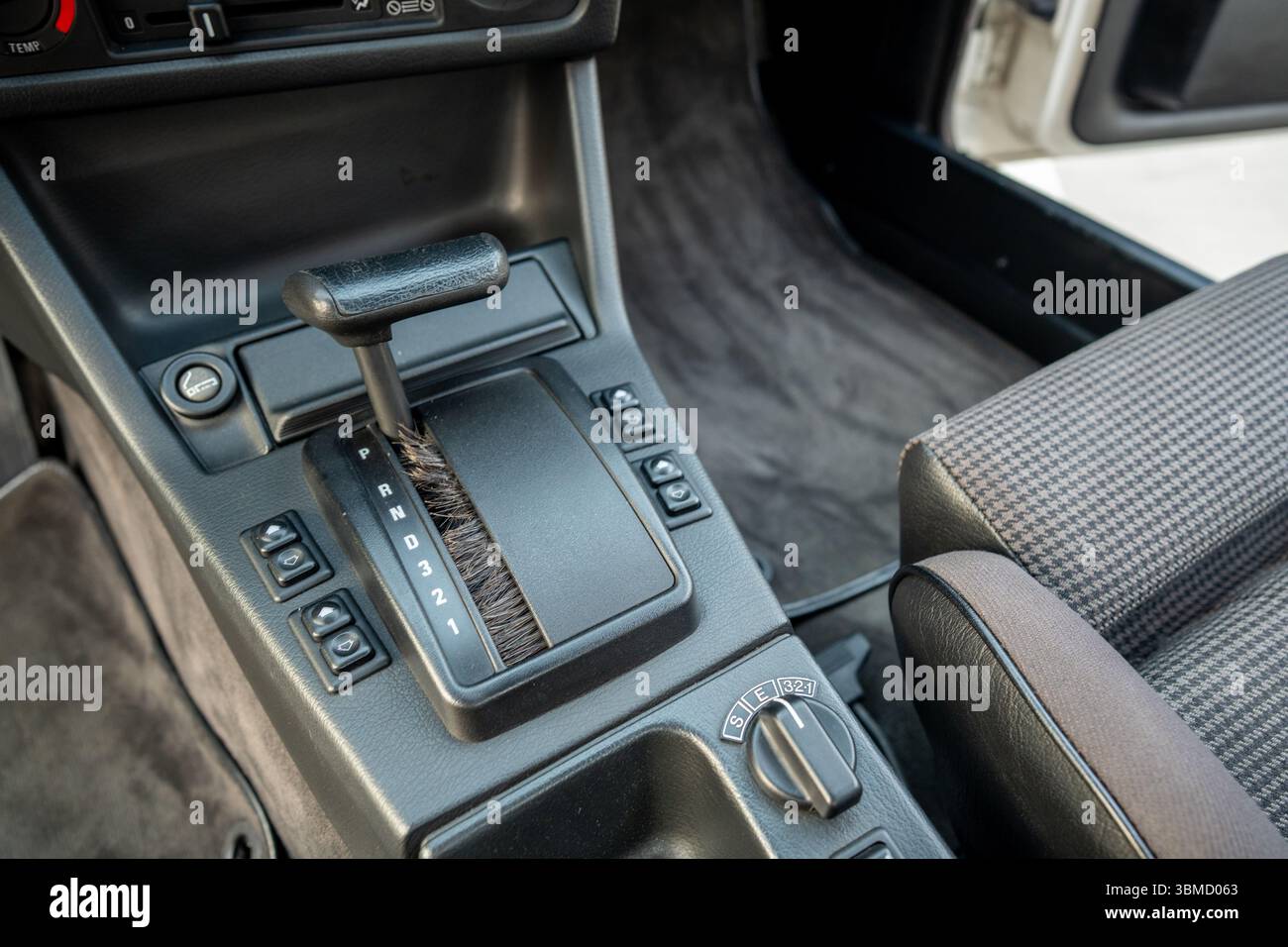 Here is a detailed view of BMW E30 car interior showcasing an intuitive ...
