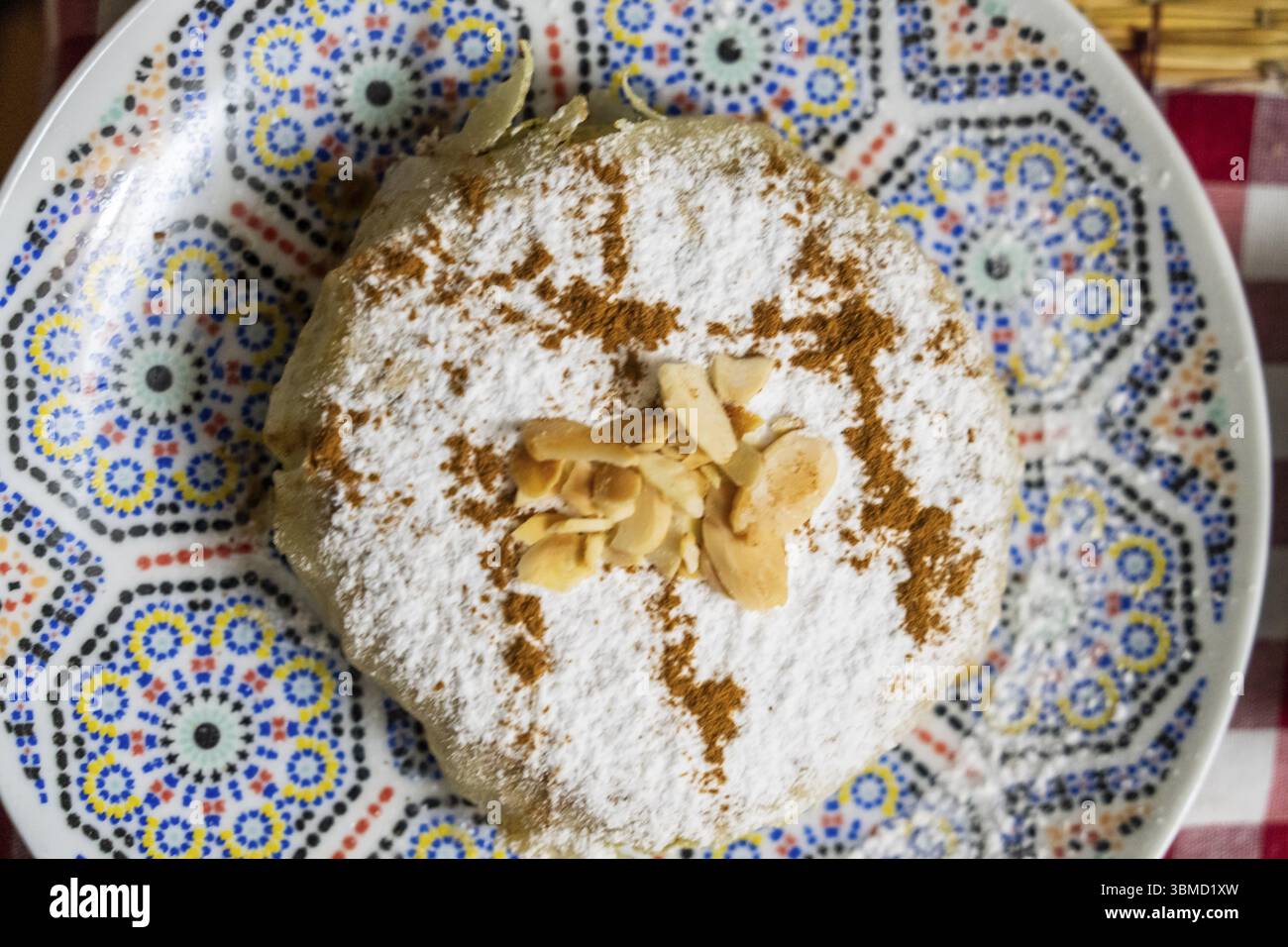 Moroccan pastilla, puff pastry filled with onion, chicken, parsley, and ...