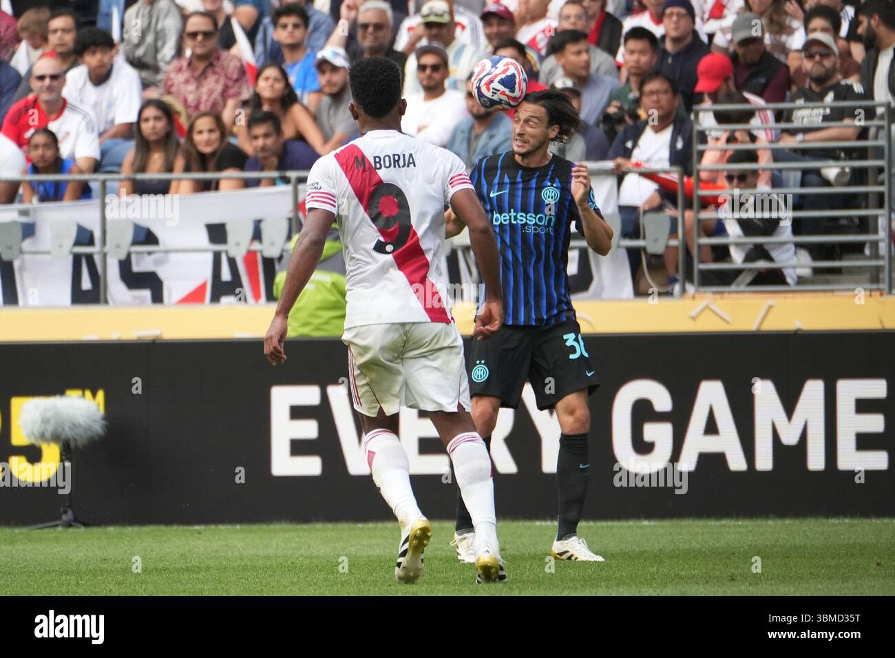 Inter Milan defender Matteo Darmian (36) heads the ball with pressure ...